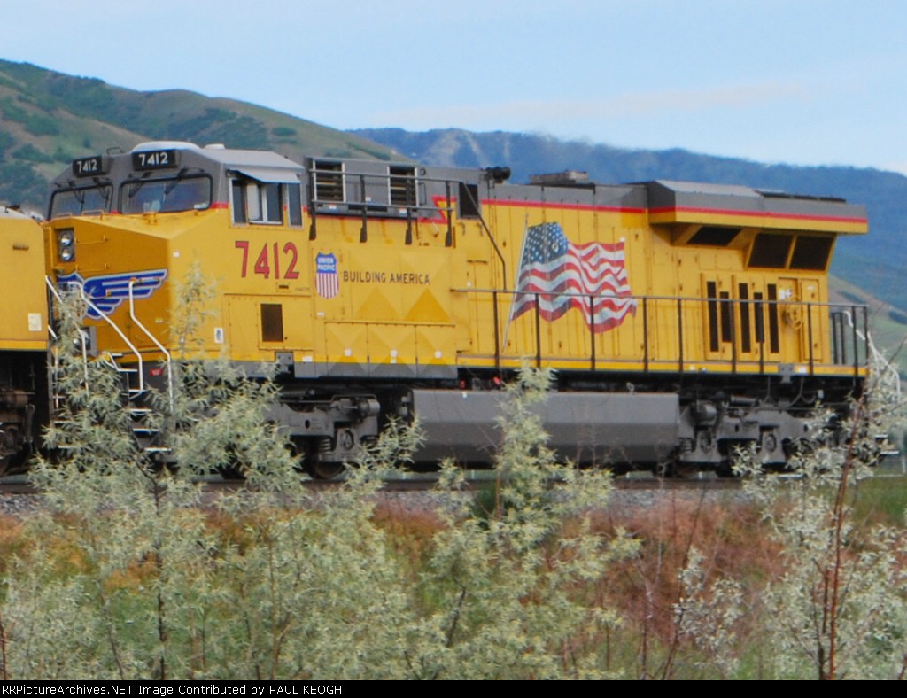 UP 7412 rolls north towards Ogden, Utah as a rear DPU on a eastbound Z-train.